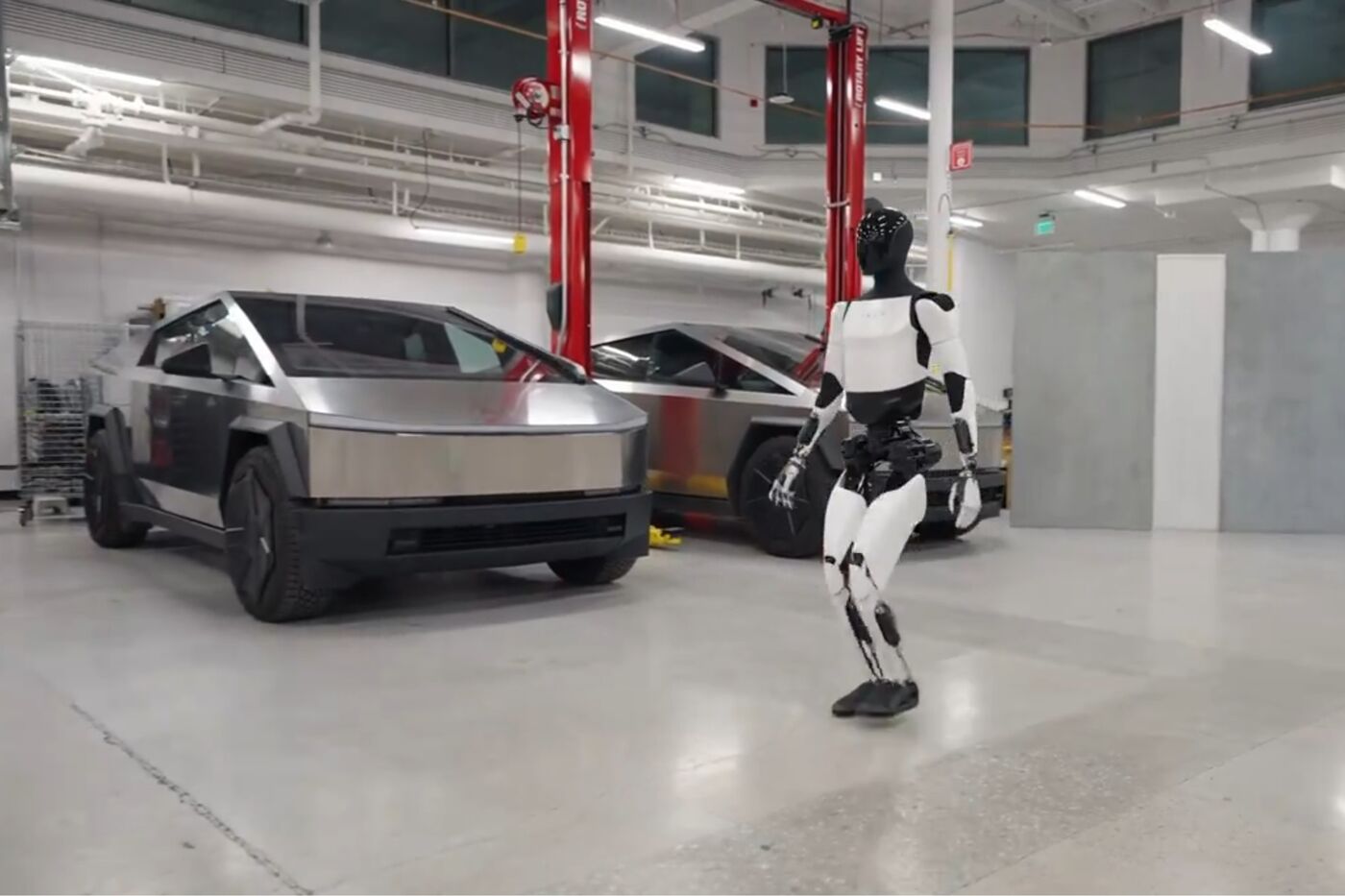 Elon Musk Teases Tesla s New Optimus Gen 2 Robot With A Funky Treat At
